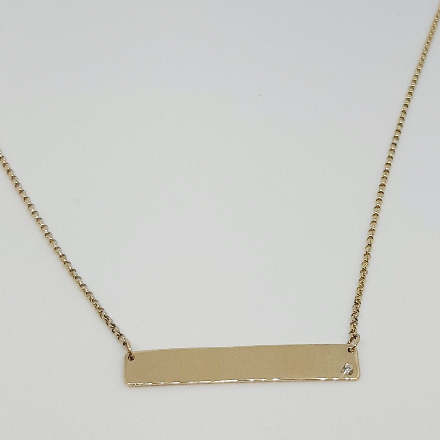 18ct yellow gold horizontal bar with Diamond – Ciaran O Flynn Jewellers